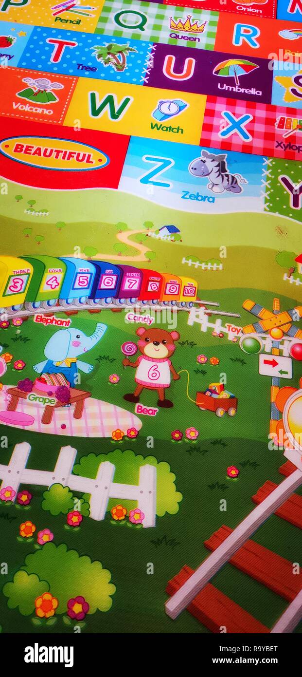 kids playing themes with alphabets Stock Photo - Alamy