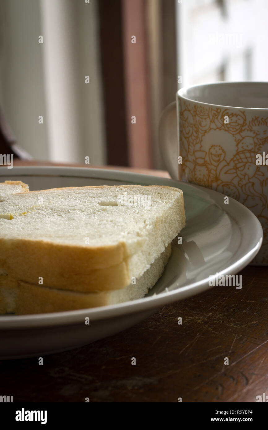 fresh bread and coffee for breakfast is taken at close range Stock ...
