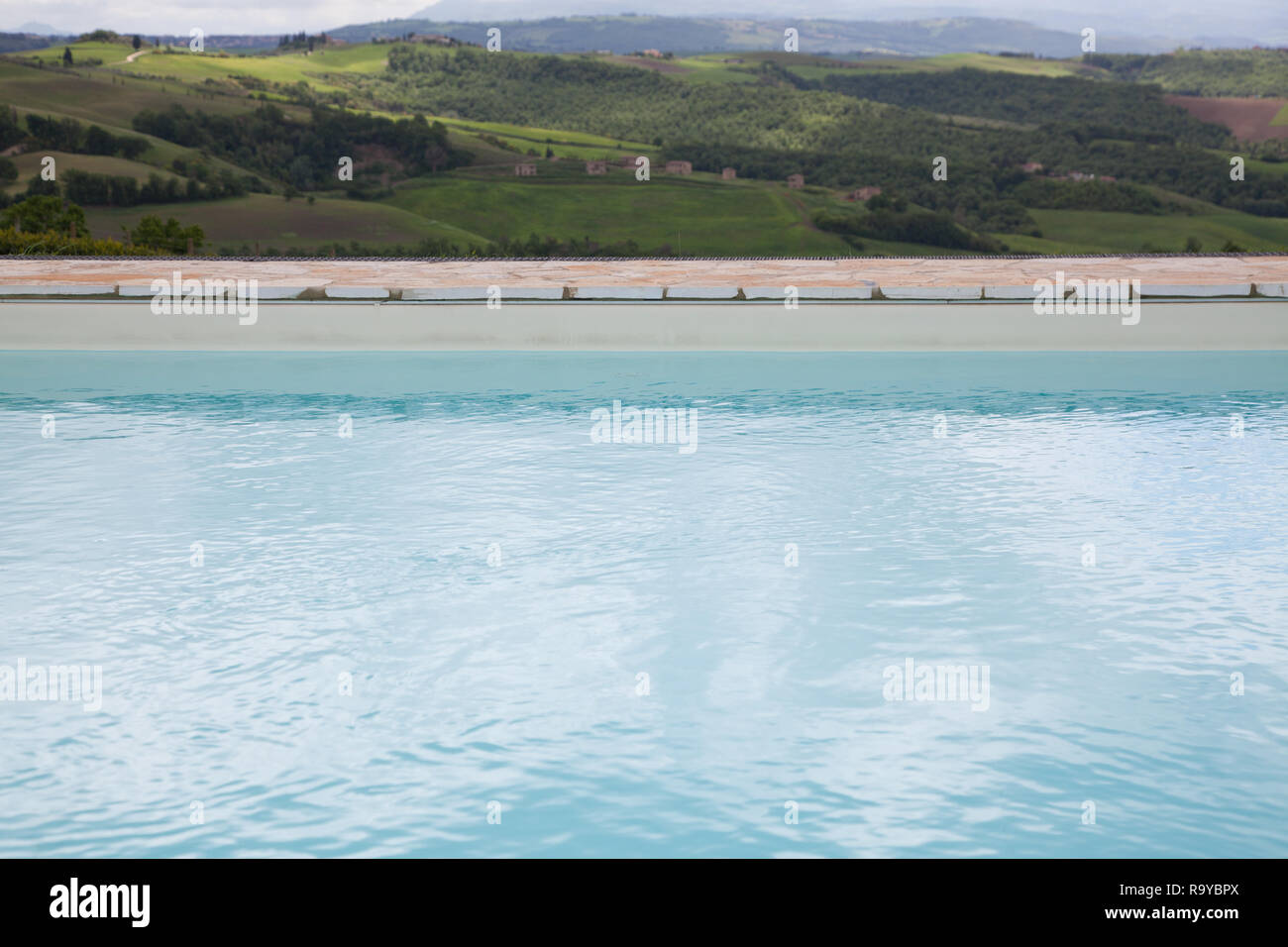 swimming pool against beautiful landscape in Tuscany Stock Photo - Alamy