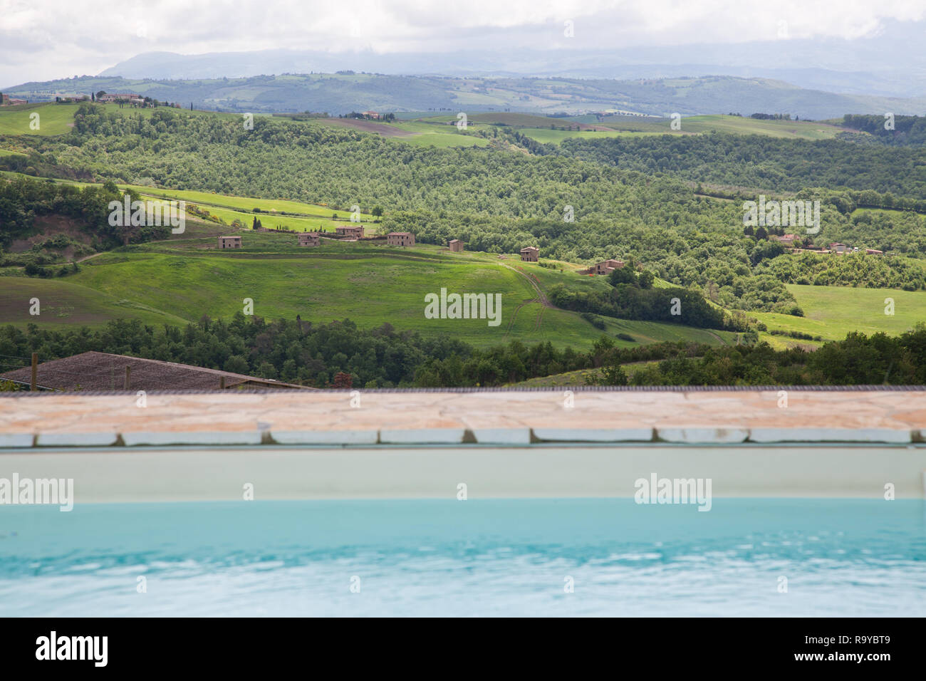 swimming pool against beautiful landscape in Tuscany Stock Photo - Alamy