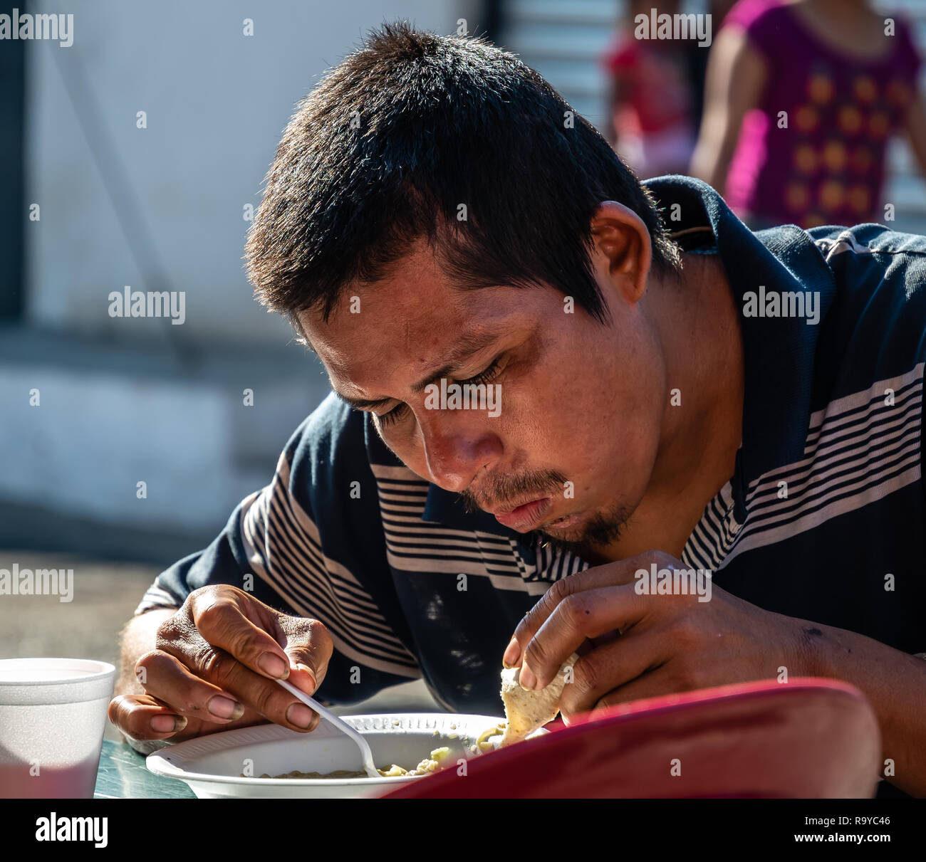 Homeless Man Eating High Resolution Stock Photography and Images - Alamy