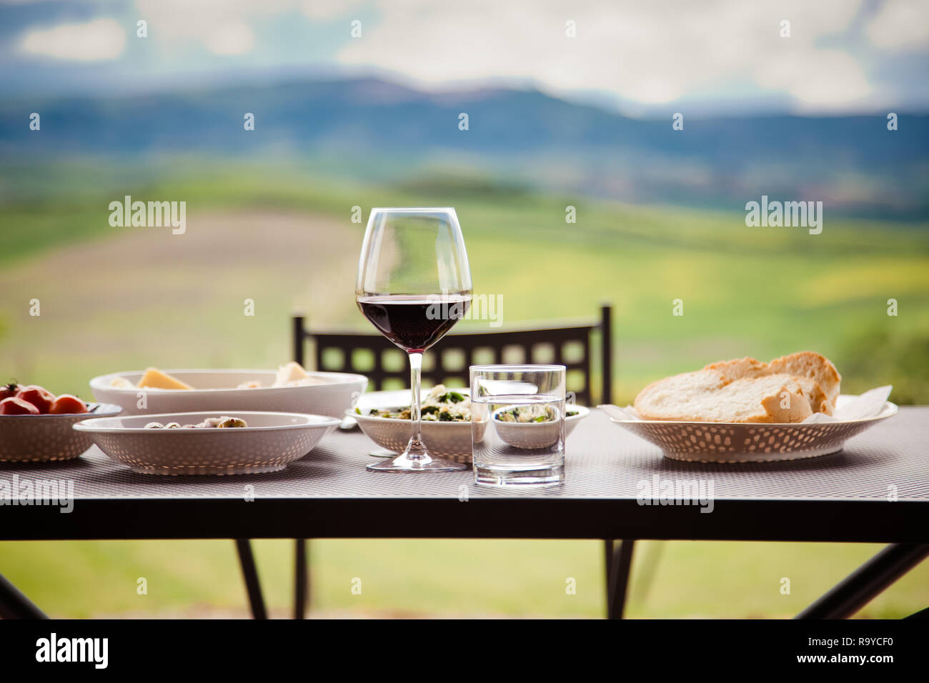 lunch with a view - table against beautiful landscape in Tuscany Stock ...