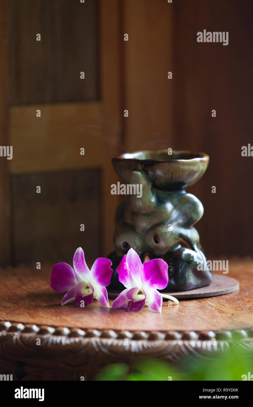 Frankincense burning on a hot coal. Frankincense is an aromatic resin ...