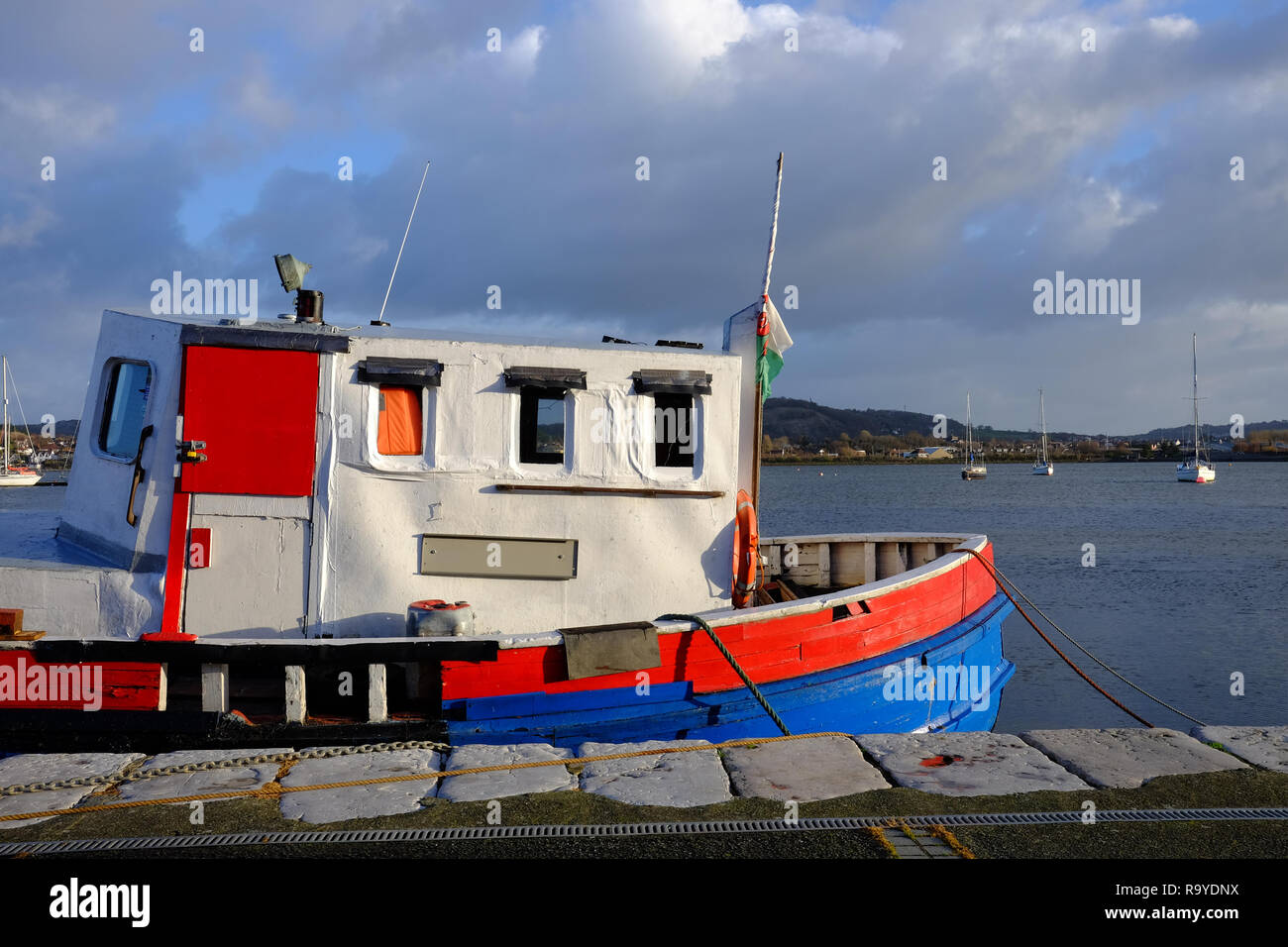 Fishing boat docked at wharf hi-res stock photography and images - Alamy
