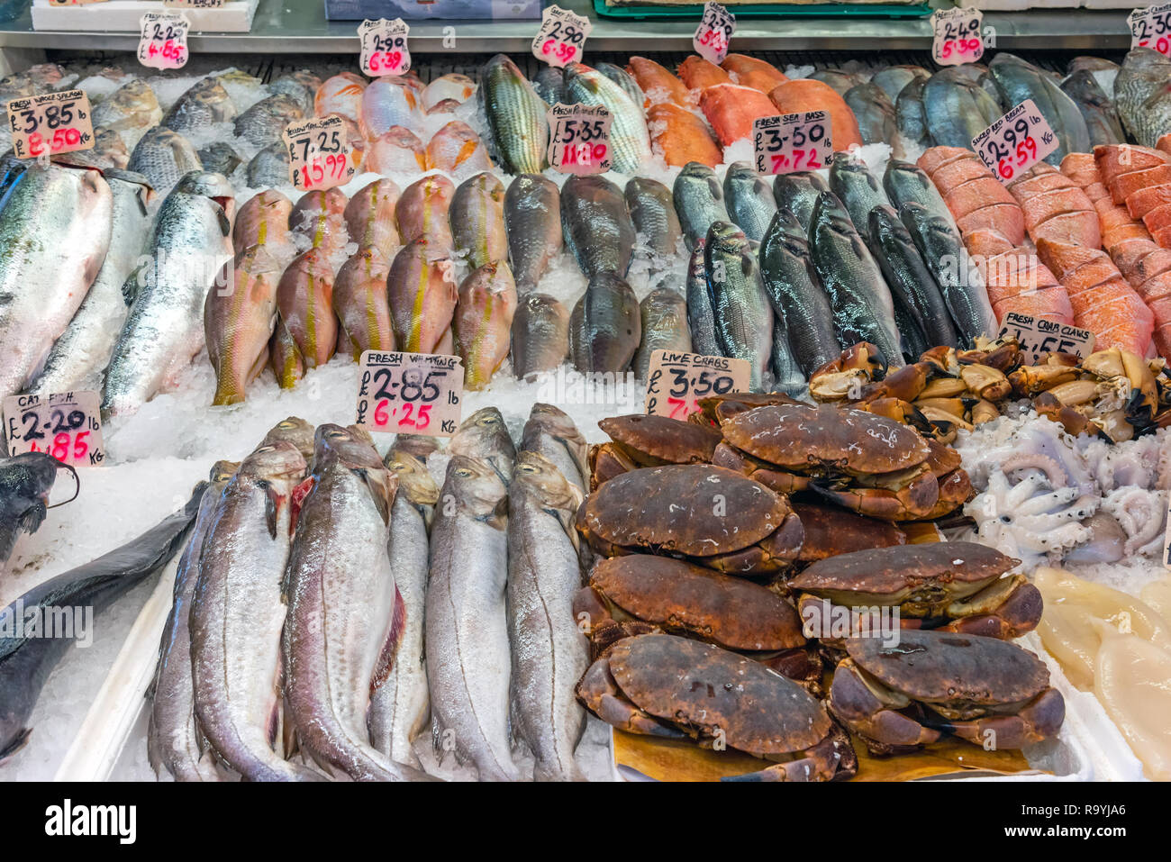 Crayfish, octopus and other fish for sale at a market in London Stock ...