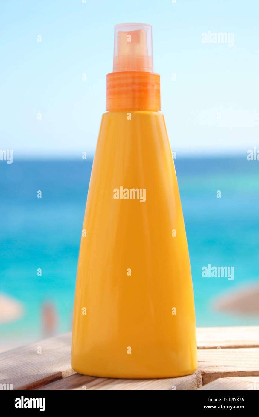 suntan lotion on the beach - summertime, skincare and beauty styled ...