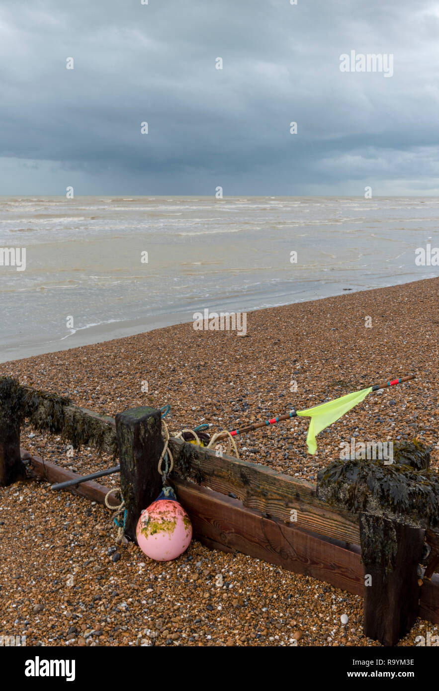 Discarded abandoned fishing gear floats, an nets tangled around a ...