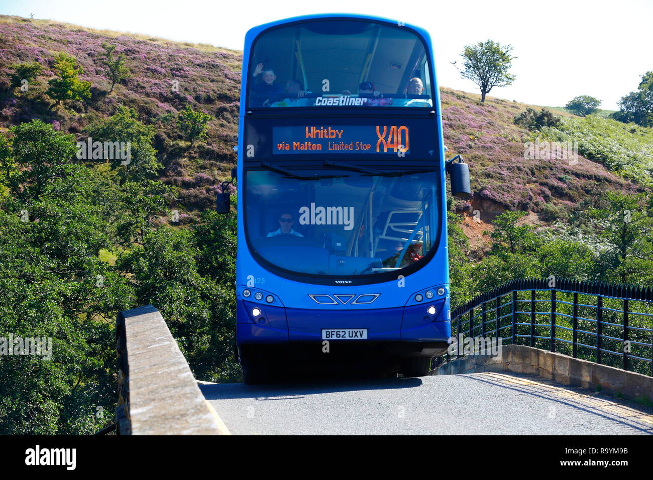 The Yorkshire Coastliner X40 bus service maneuvers around a narrow ...