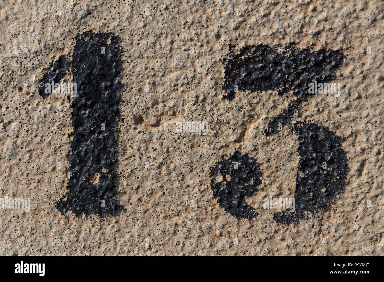 number thirteen painted stencil on concrete wall, number 13 Stock Photo ...