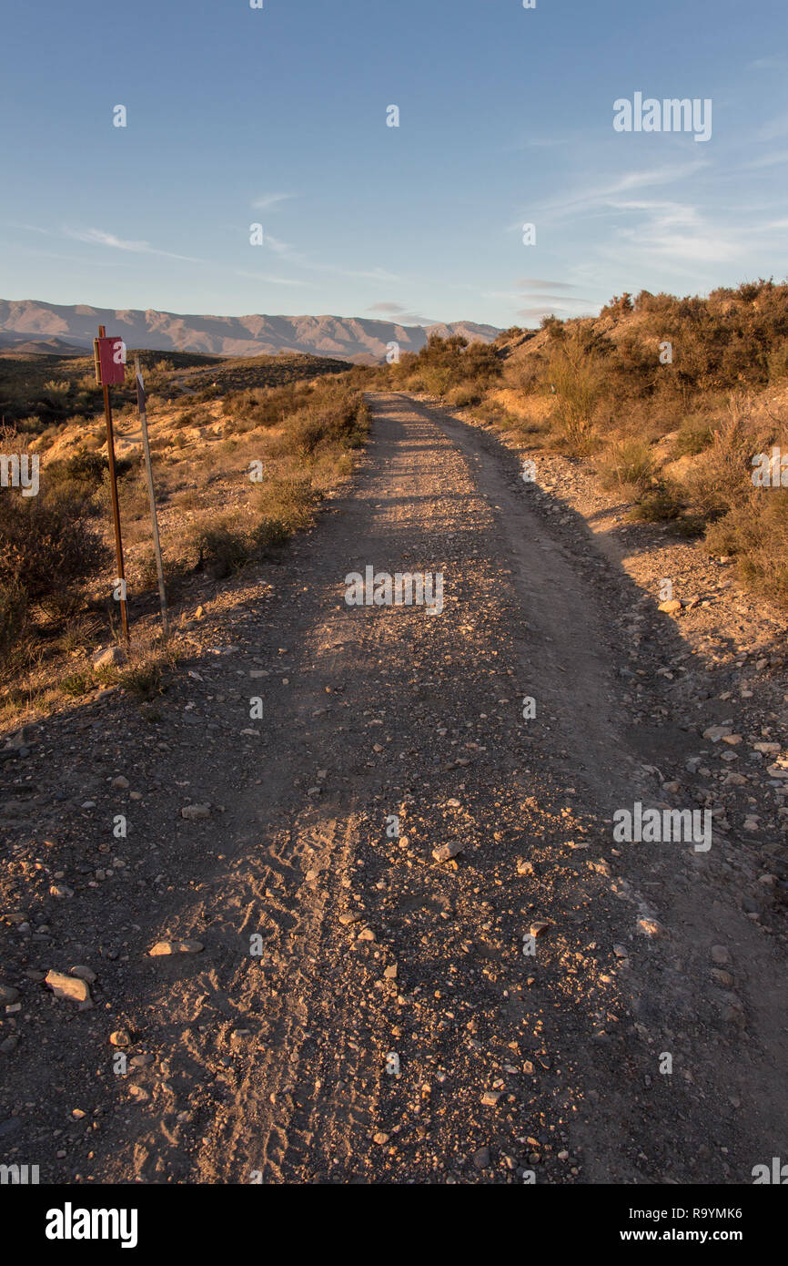 old dirt road in the desert, loneliness Stock Photo - Alamy