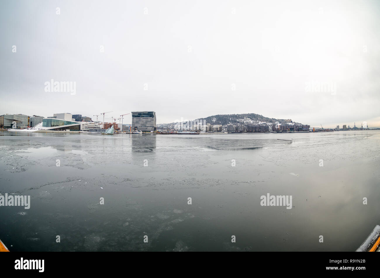 Winter cold view of Oslo Opera House and new Munch Museum building ...