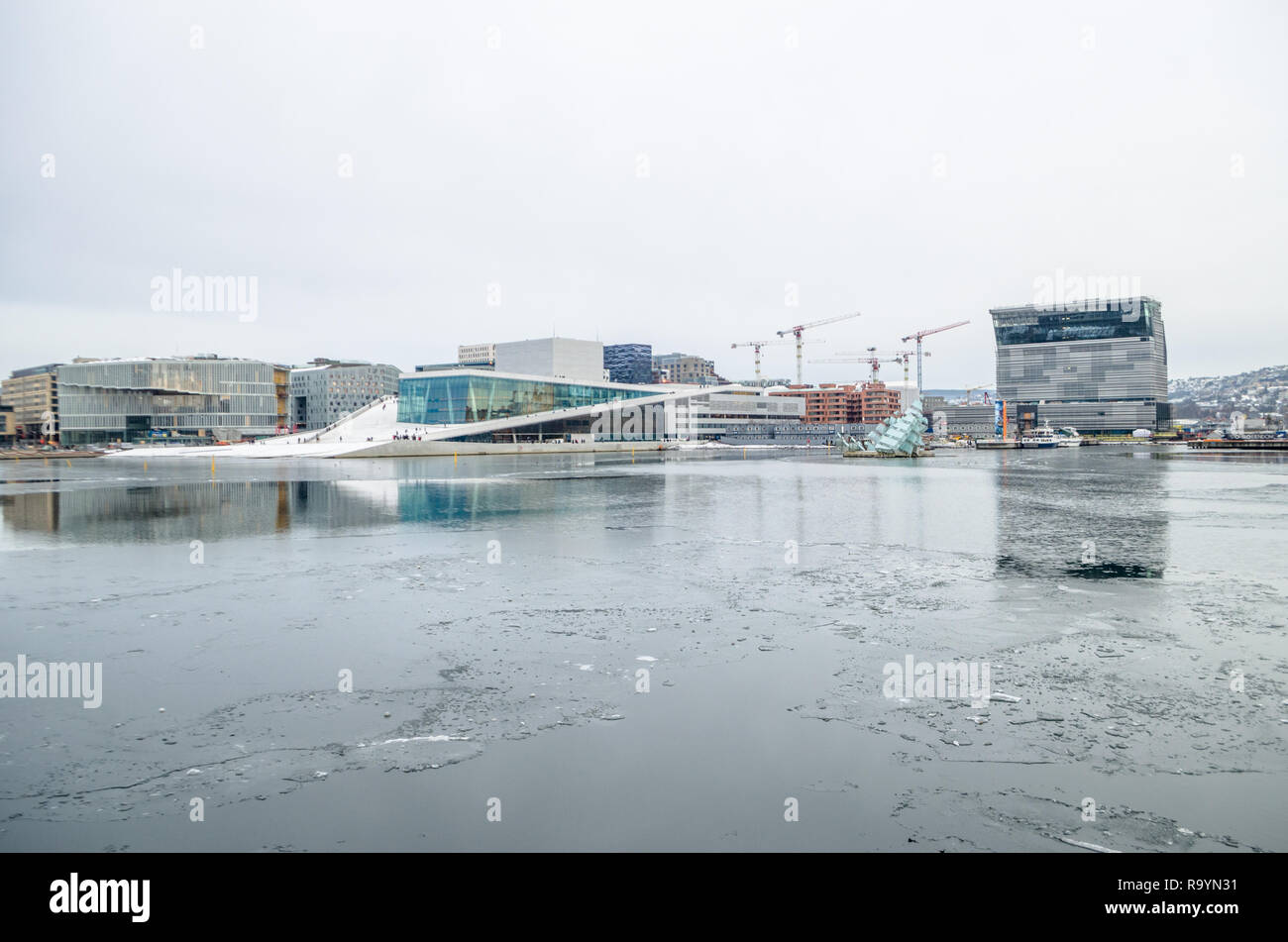 Winter cold view of Oslo Opera House and new Munch Museum building ...