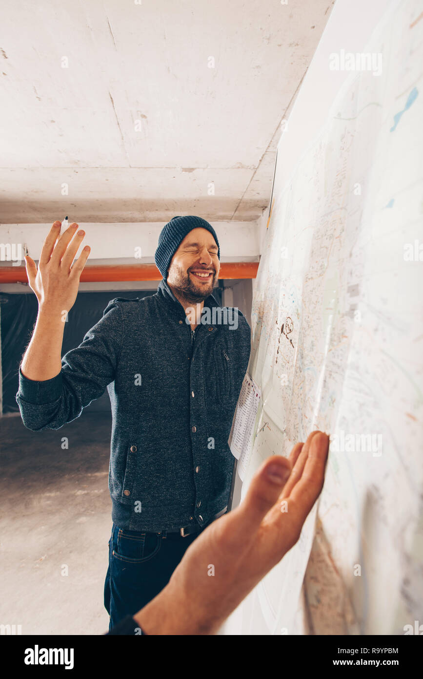 Criminals are making a plan for heist on the map, they are talking and ...