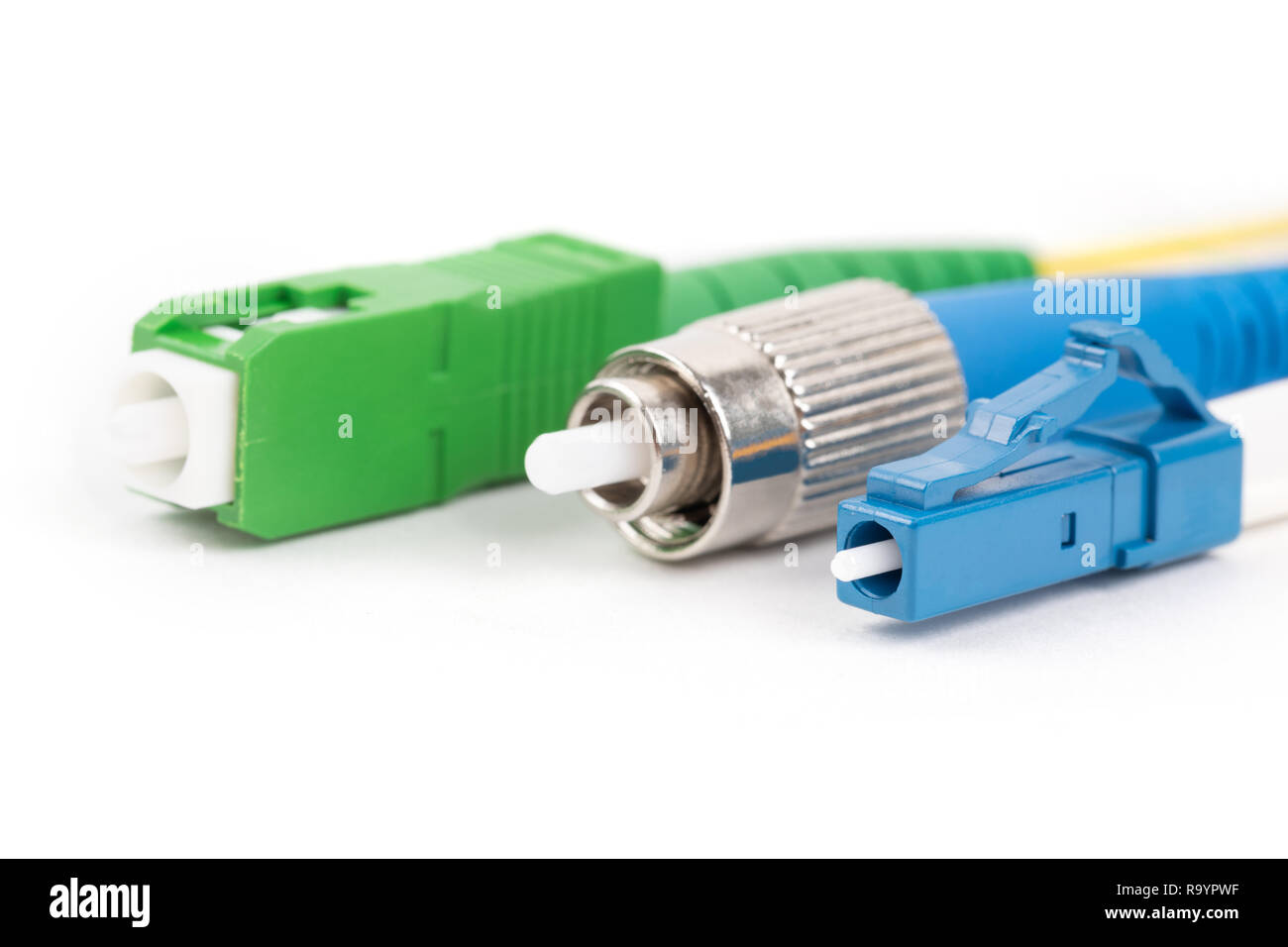 collection of different single mode fiber optic connectors isolated on ...