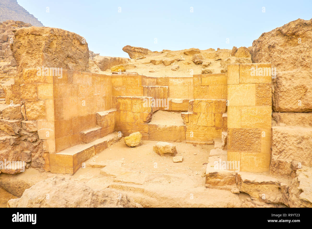 The ruins of ancient Egyptian construstion with hieroglyphs on the ...