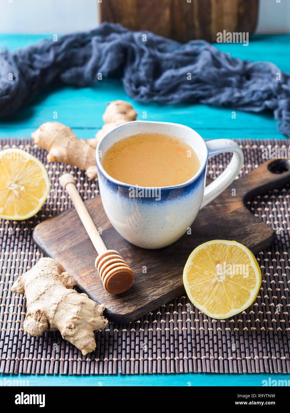 Lemon ginger hot tea drink with honey as natural remedy Stock Photo - Alamy