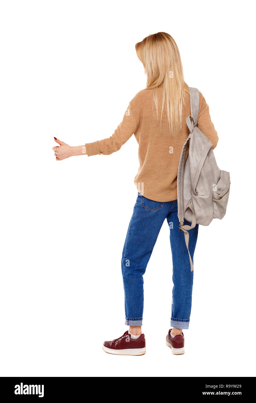 Back view woman with a backpack. Standing young girl . Rear view people ...