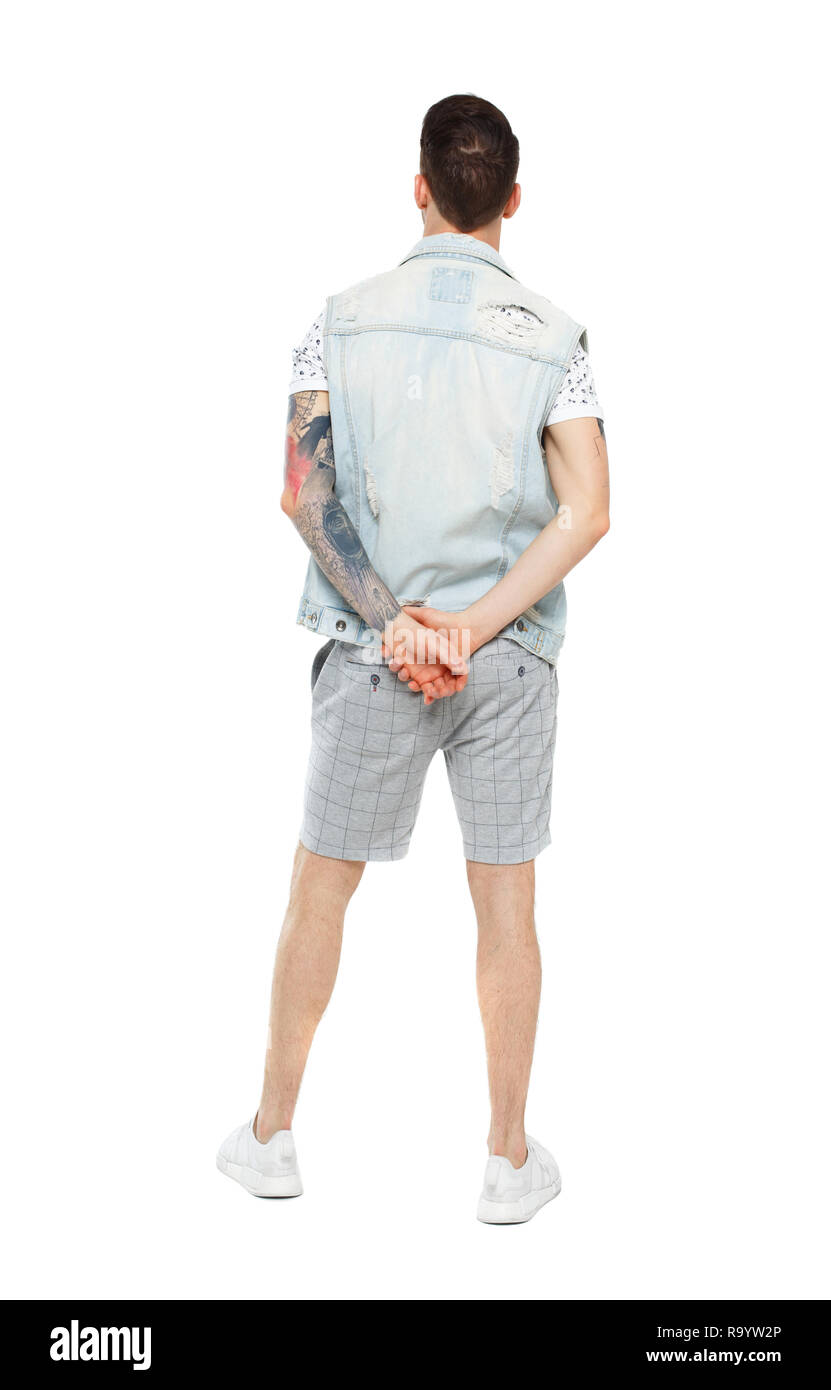 Back view of a stylish man iin shorts. Rear view people collection ...