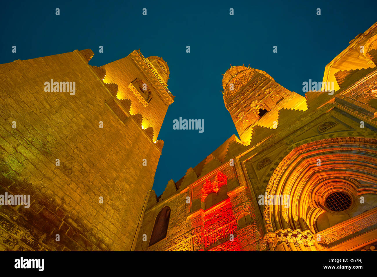 The beautiful carved stone minarets of Qalawun Complex in bright ...