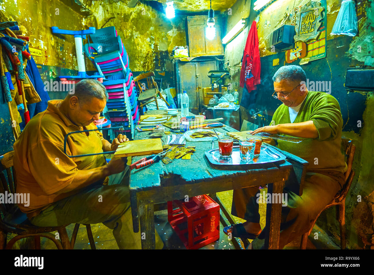 CAIRO, EGYPT - DECEMBER 20, 2017: Two carpenters in small workshop on ...