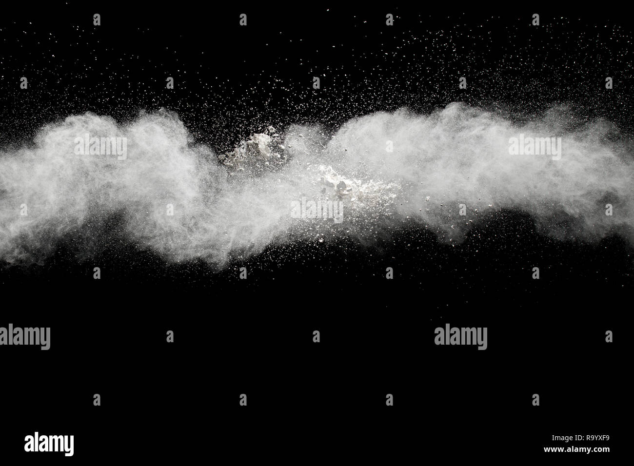 Bizarre forms of white powder explosion on white background.Launched ...