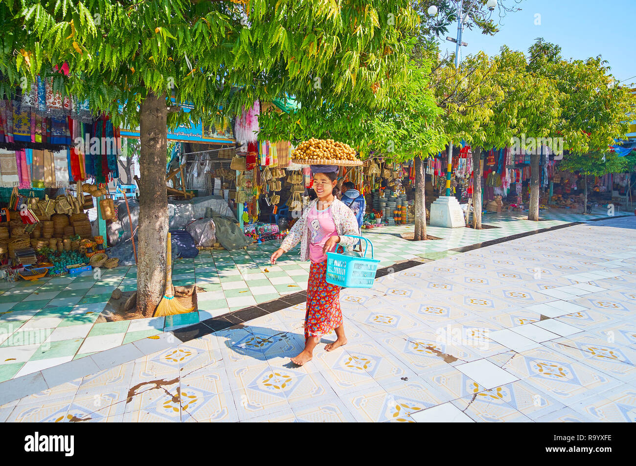 SAGAING, MYANMAR - FEBRUARY 21, 2018: The betel nuts seller with tray ...
