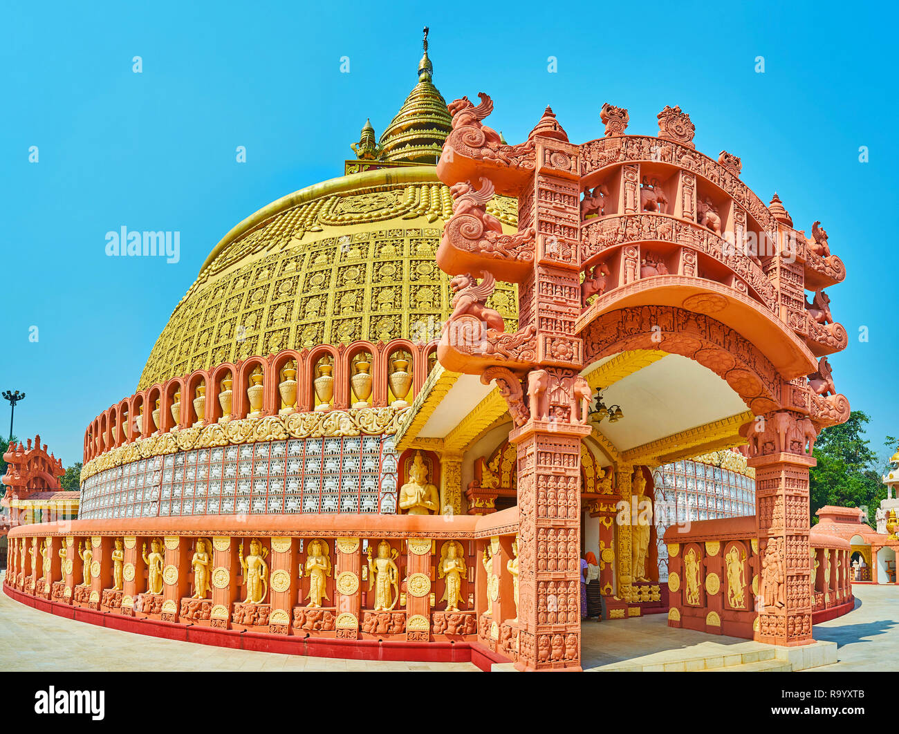 The intricate carved patterns and figures cover masterpiece torana gate ...