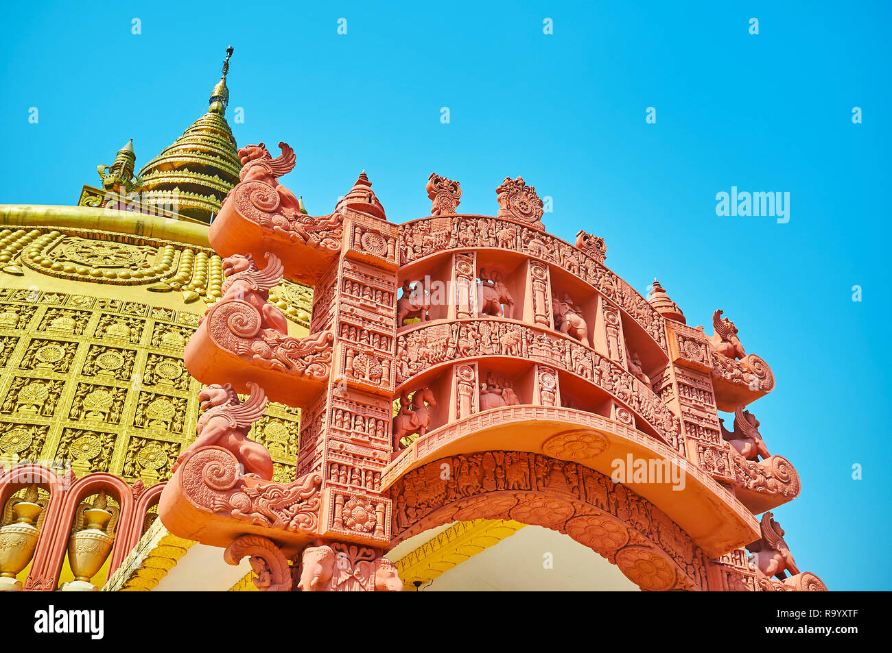Details of the decorative terracotta torana gate with numerous ...