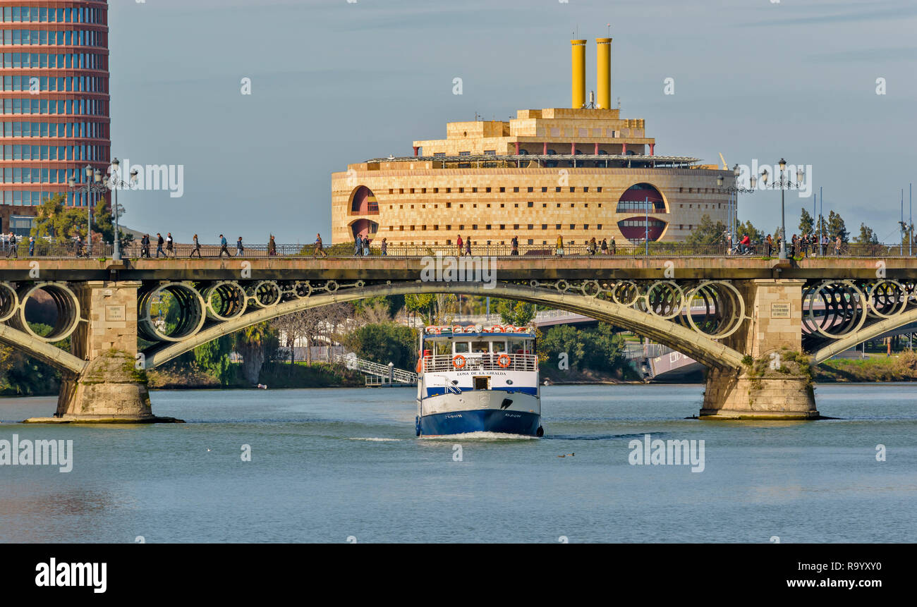 SEVILLE SPAIN PASSENGER BOAT PASSING UNDER THE TRIANA BRIDGE THE ...