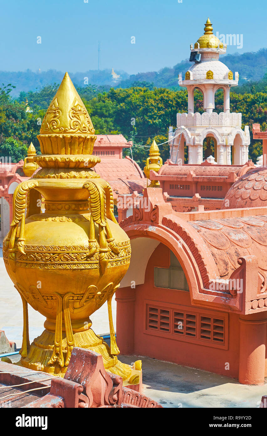 The golden decorative vase on the rooftop of the shrine of Sitagu ...