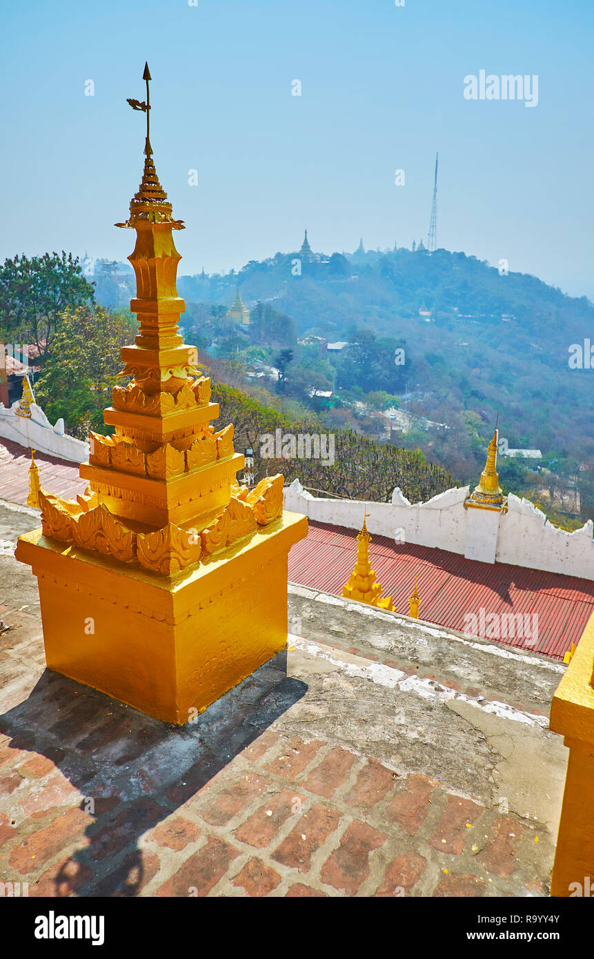 The golden stupas of U Min Thonze Temple is decorated with scenic ...