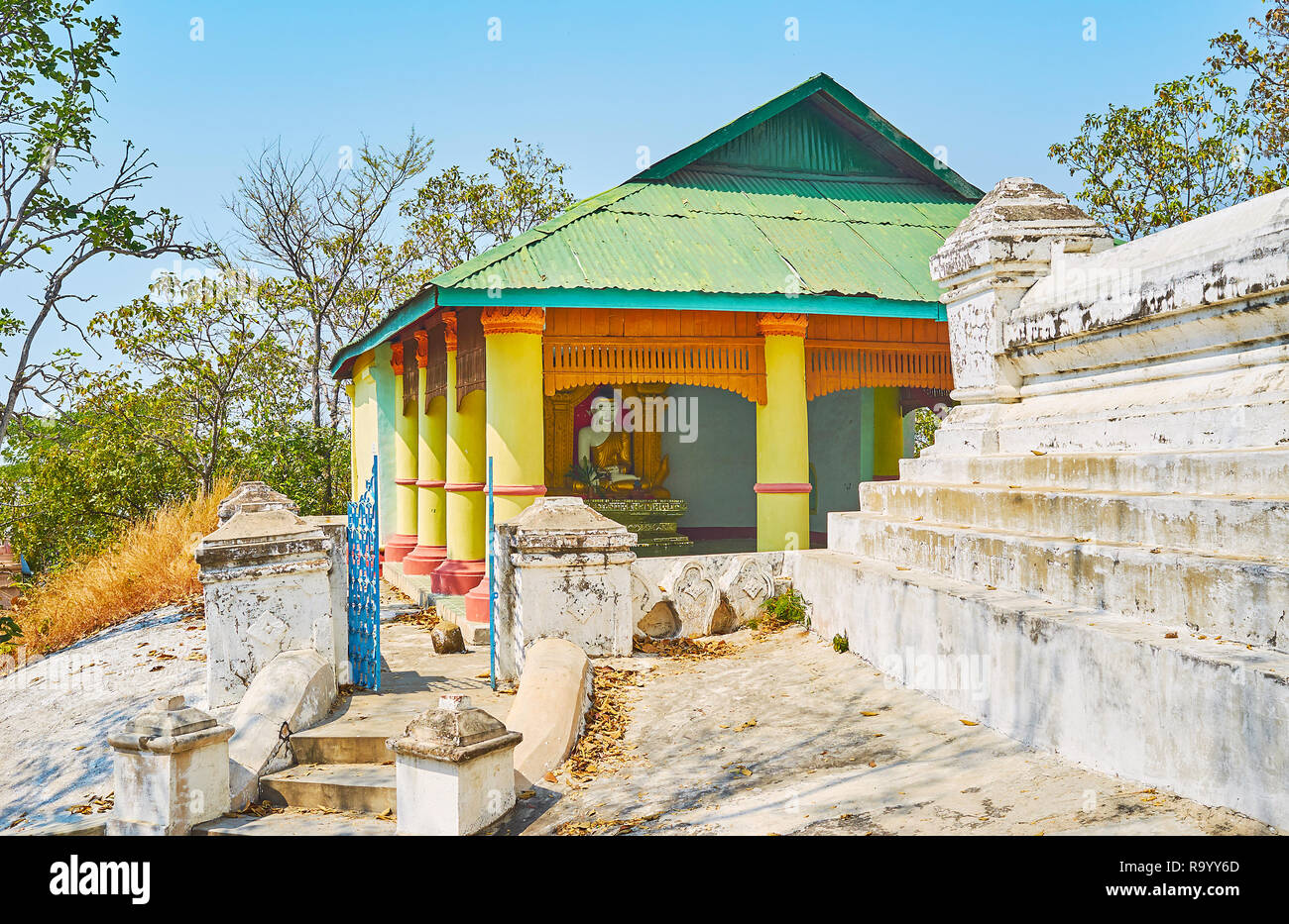 The image House with statue of Buddha Touching Earth, located in U Min ...