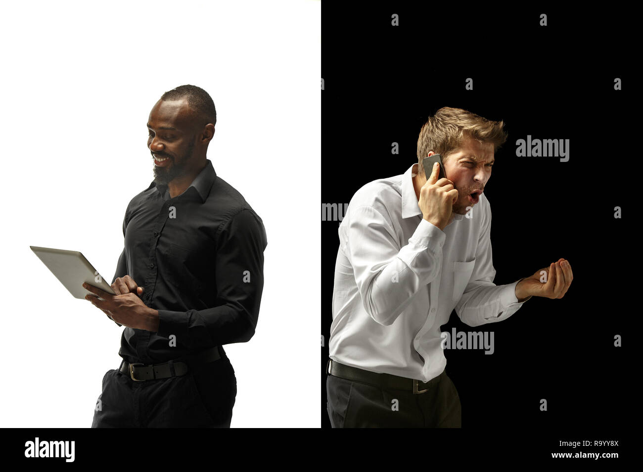 The success happy afro and caucasian men. Mixed couple with gadget ...