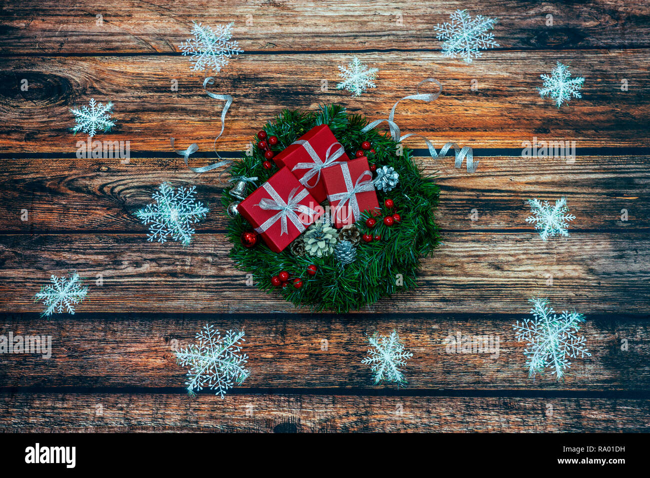 Christmas gift boxes with snowflake flame Stock Photo - Alamy