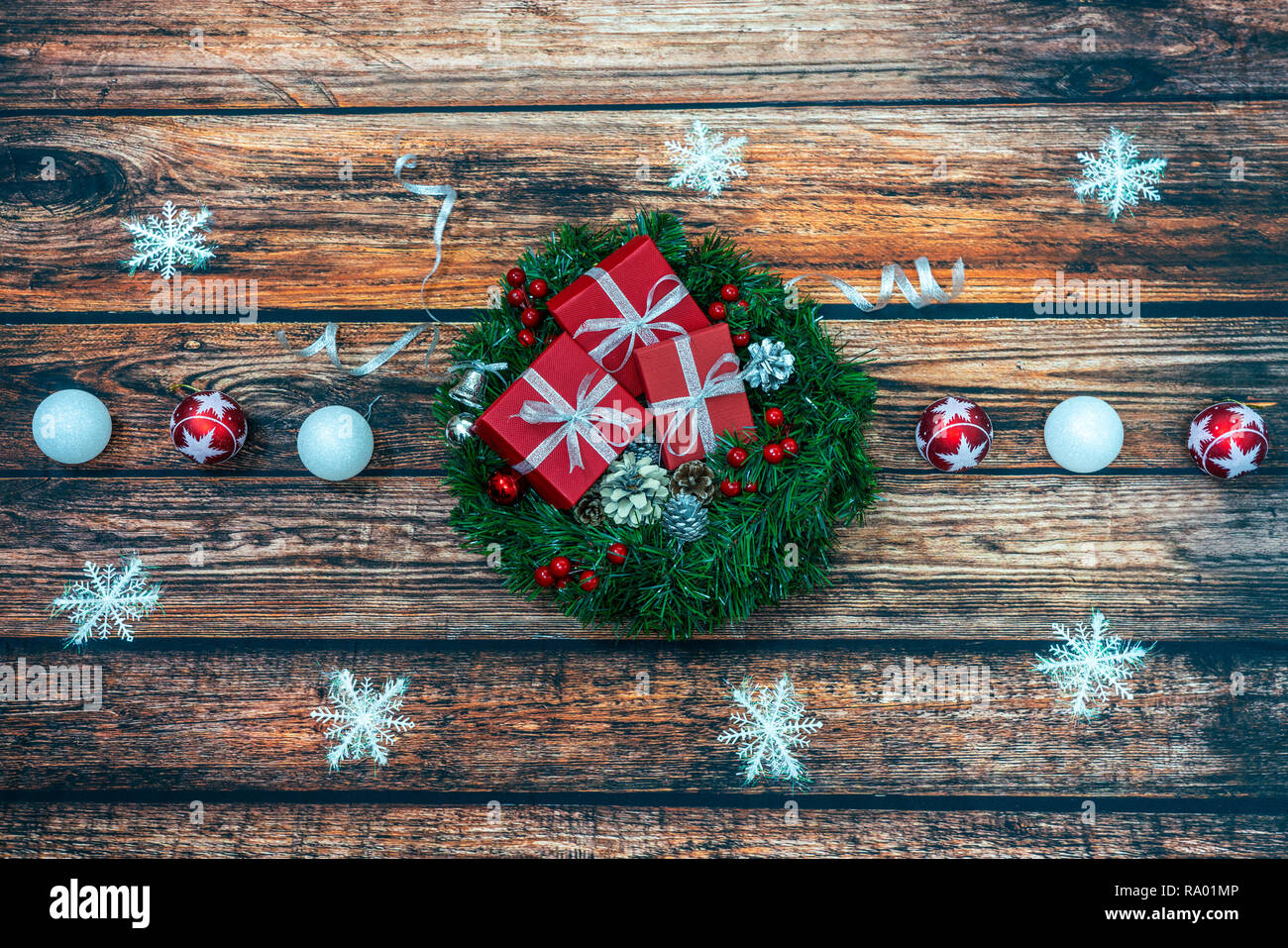 Christmas gift boxes with snowflake flame Stock Photo - Alamy