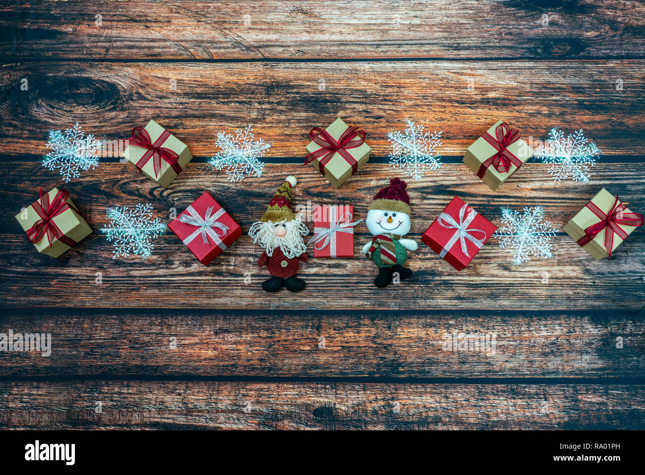 Christmas gift boxes with snowflake flame Stock Photo - Alamy