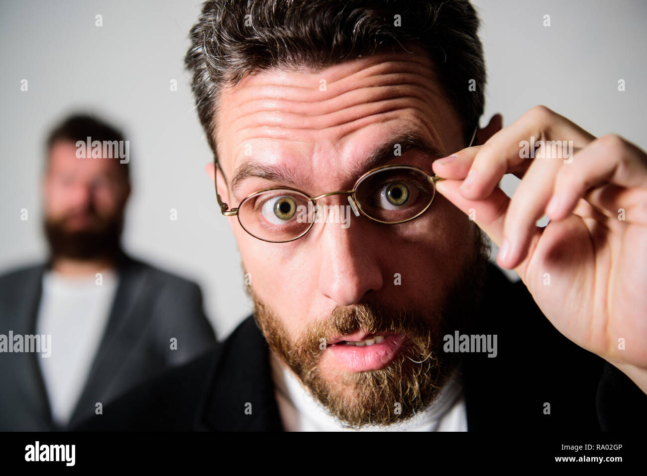 Picky smart inspector. Man handsome bearded guy wear eyeglasses. Eye ...