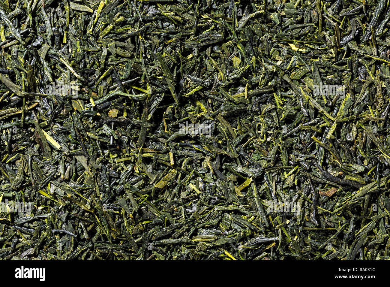 Sencha green tea leaves full frame, view directly from above Stock ...