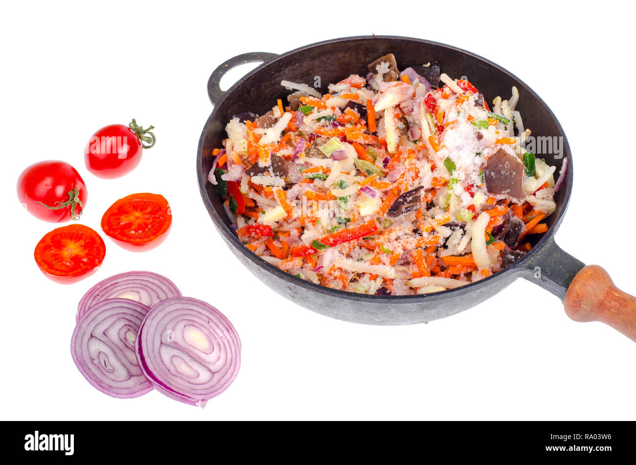 Frozen vegetables in apan, spices for cooking. Studio Photo Stock Photo ...