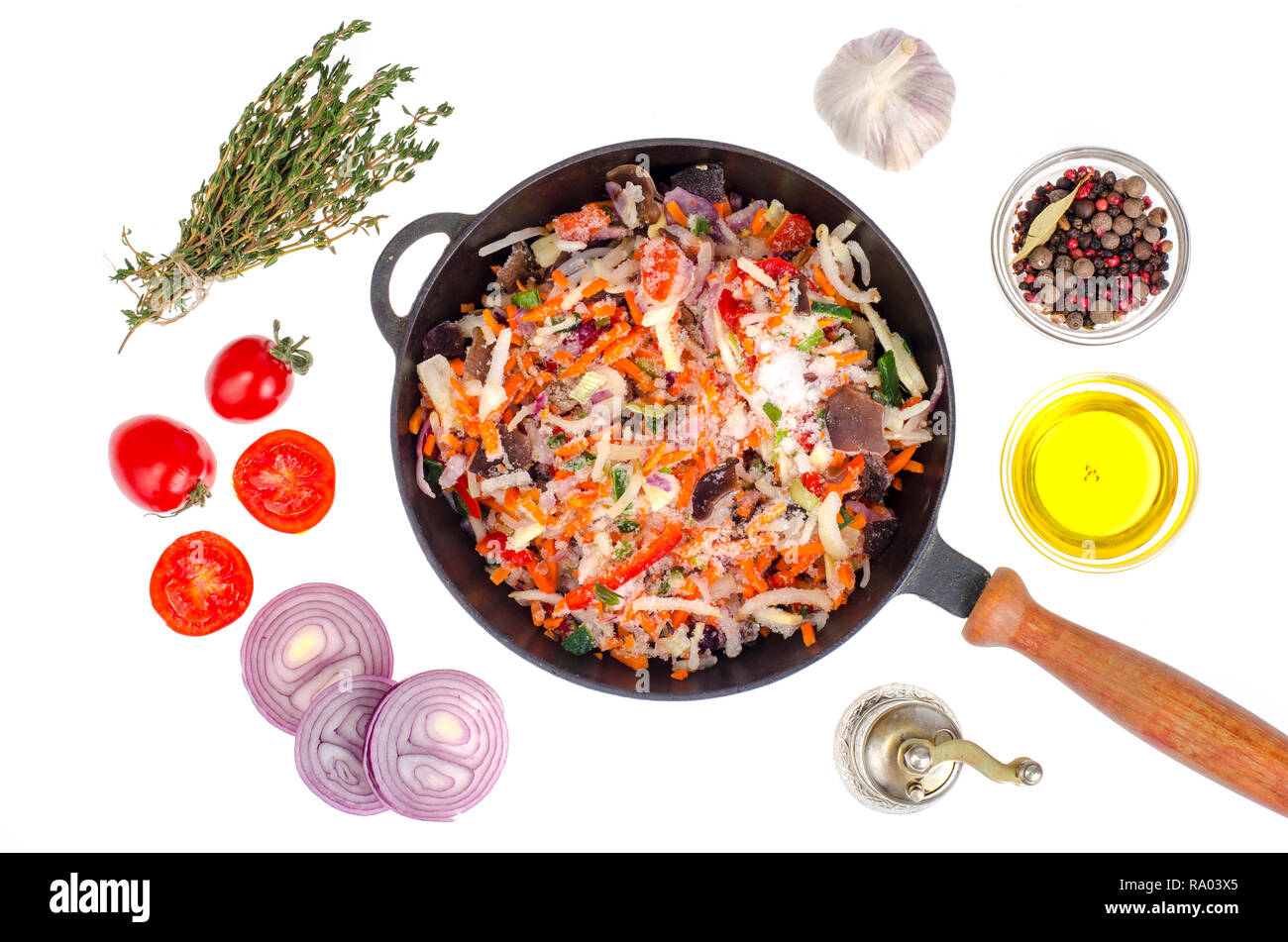 Frozen vegetables in apan, spices for cooking. Studio Photo Stock Photo ...