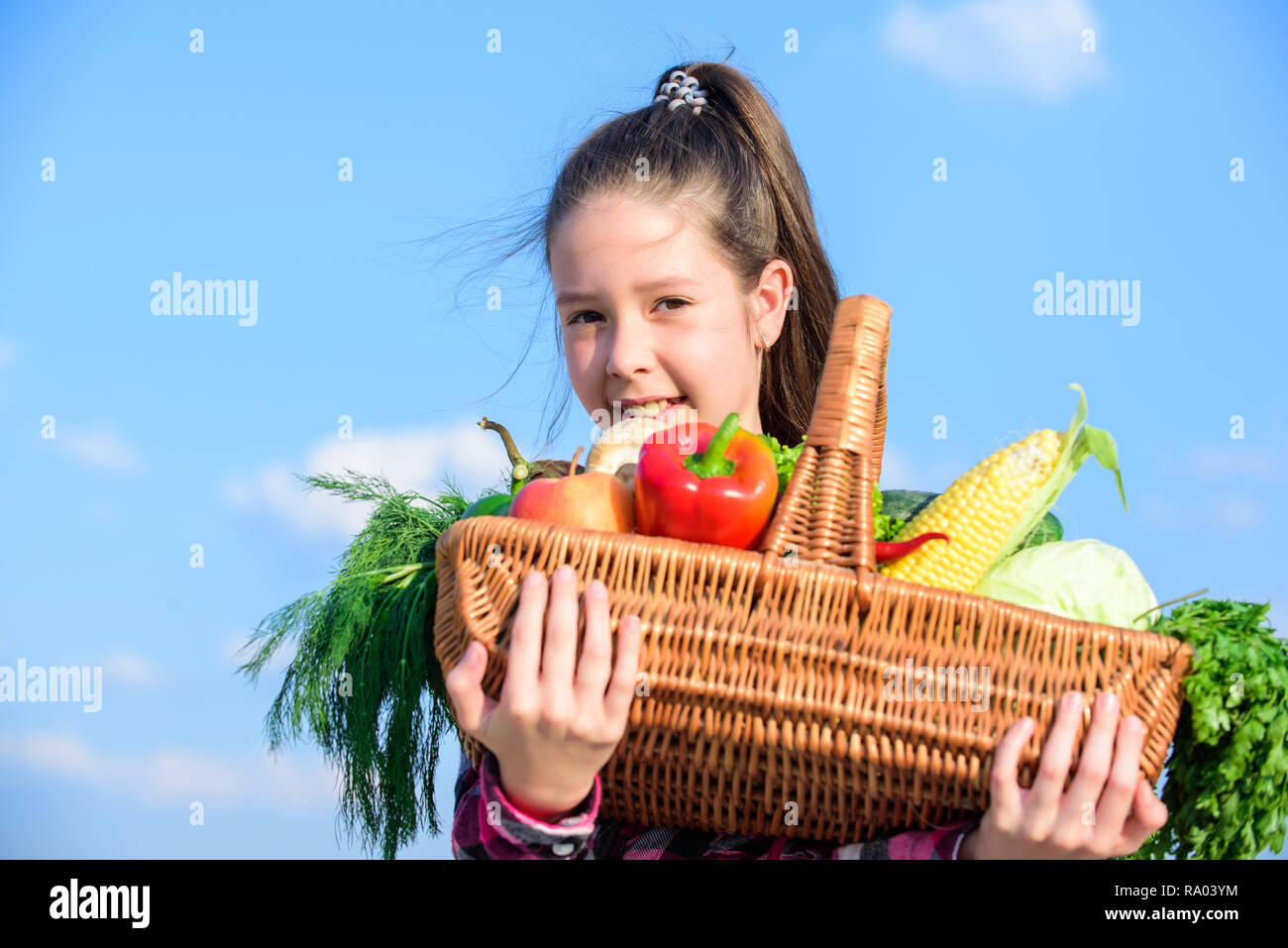 Harvest festival concept. Childhood in countryside. Kid farmer with ...