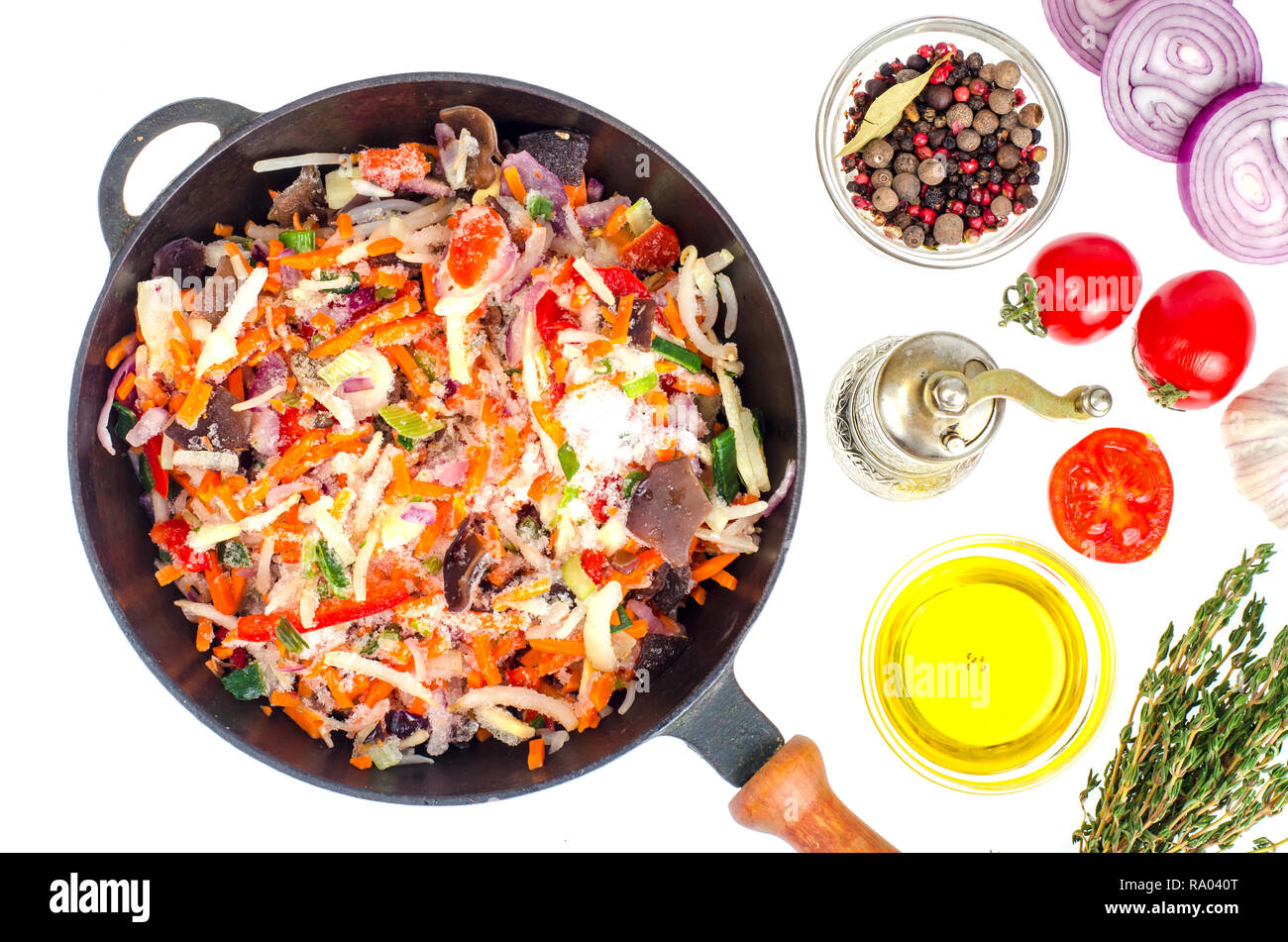 Frozen vegetables in apan, spices for cooking. Studio Photo Stock Photo ...