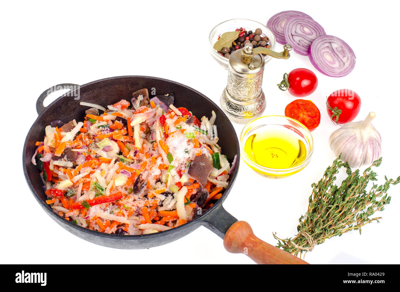 Frozen vegetables in apan, spices for cooking. Studio Photo Stock Photo ...