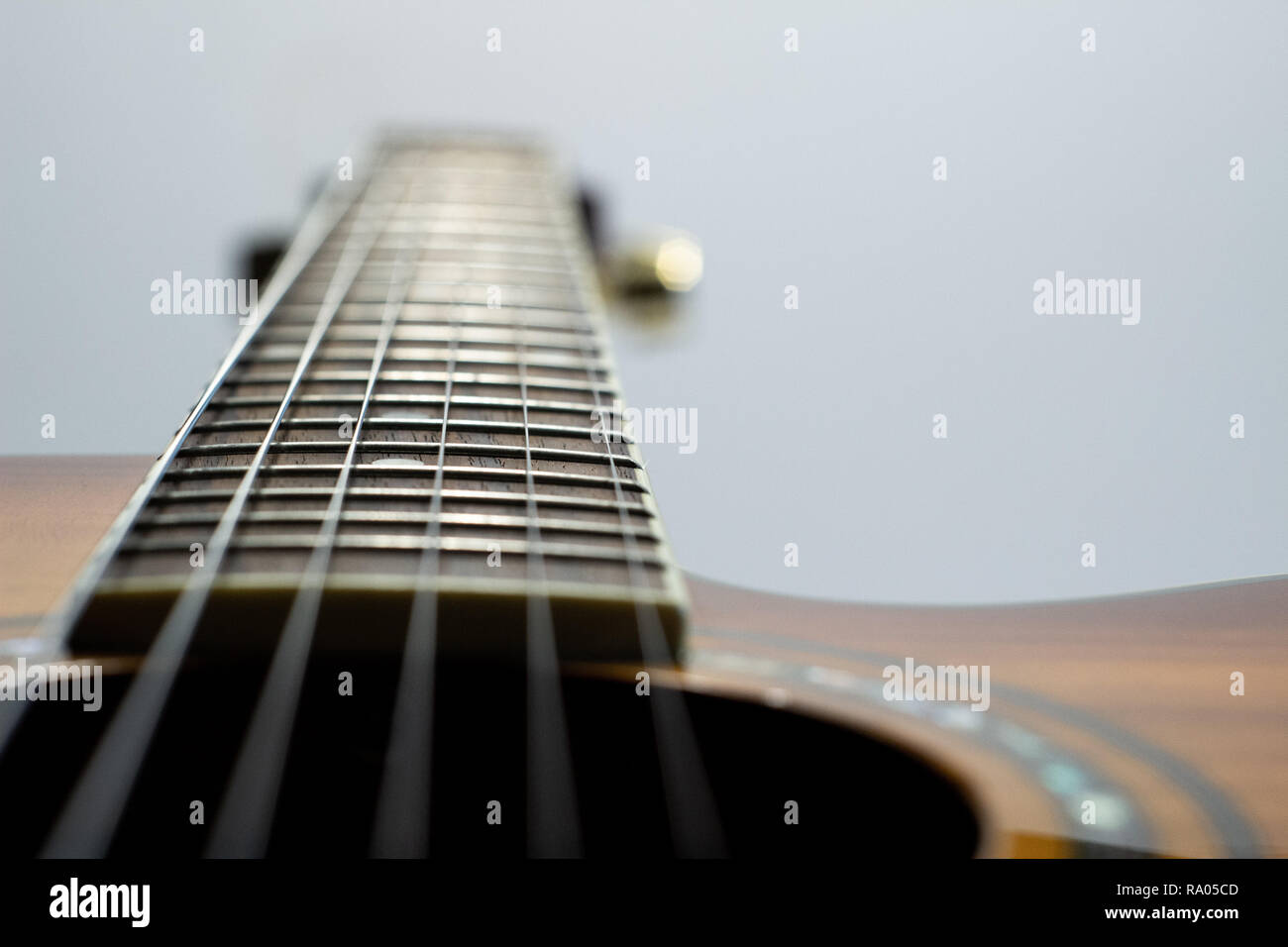 Musical instrument angle shot of guitar strings with blur Stock Photo ...