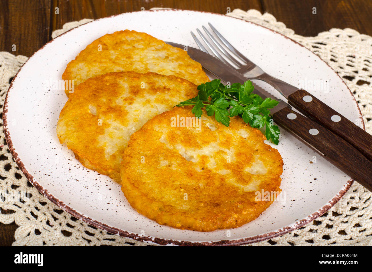 Vegetable rosti, golden fried potato pancakes with dips from ...
