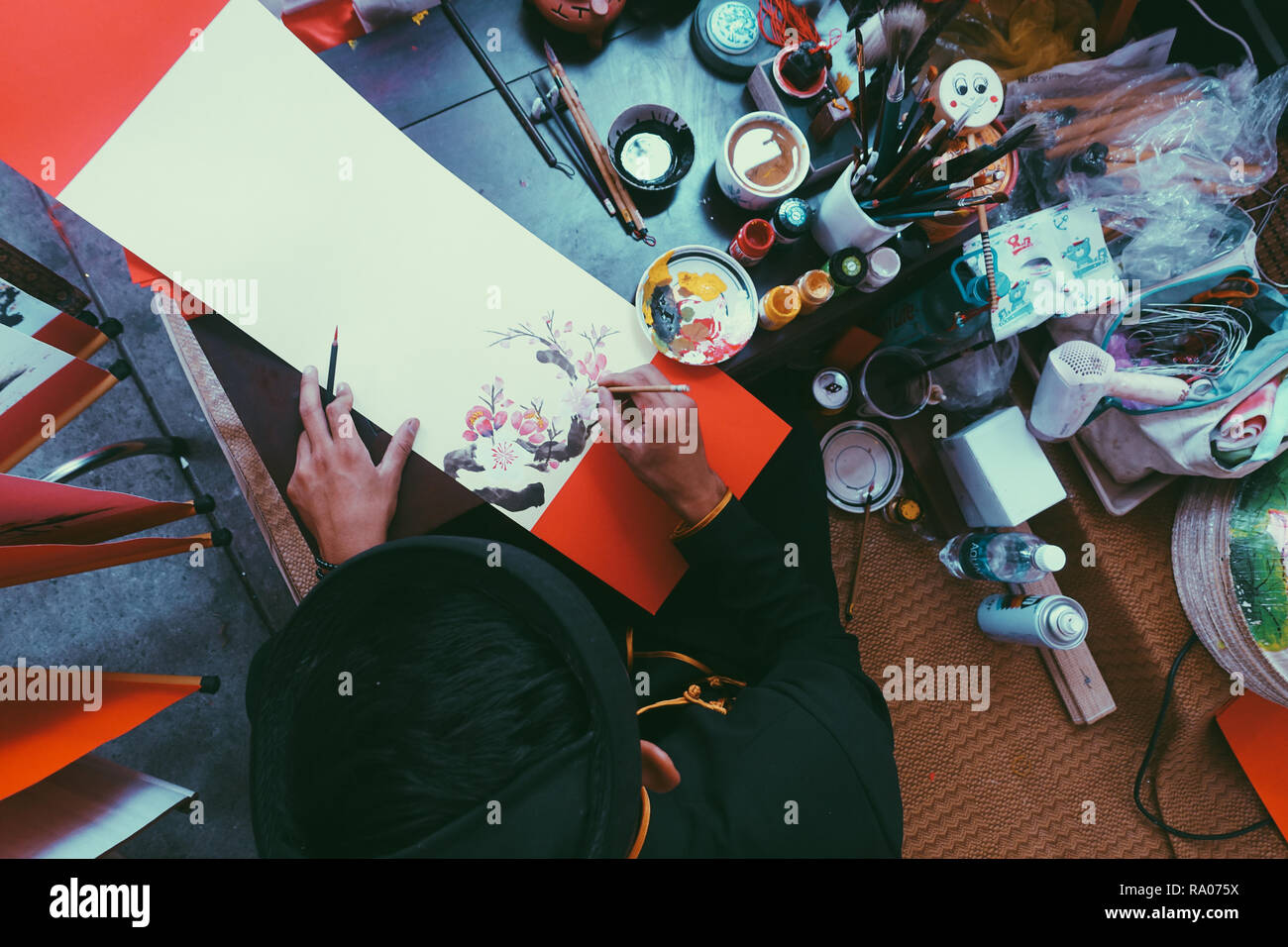 Vietnamese scholar write calligraphy at lunar new year. Calligraphy ...