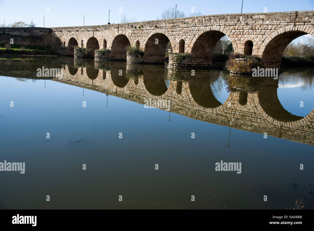 Roman bridge over guadiana river in merida hi-res stock photography and ...