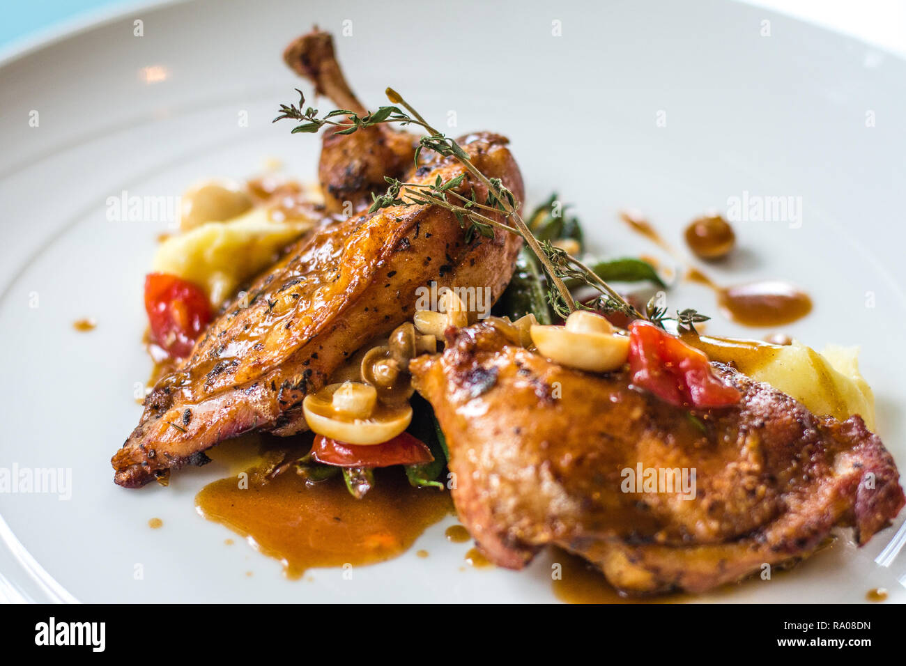 Grilled Poulet creamy mashed purple yam and sautéed vegetables Stock ...