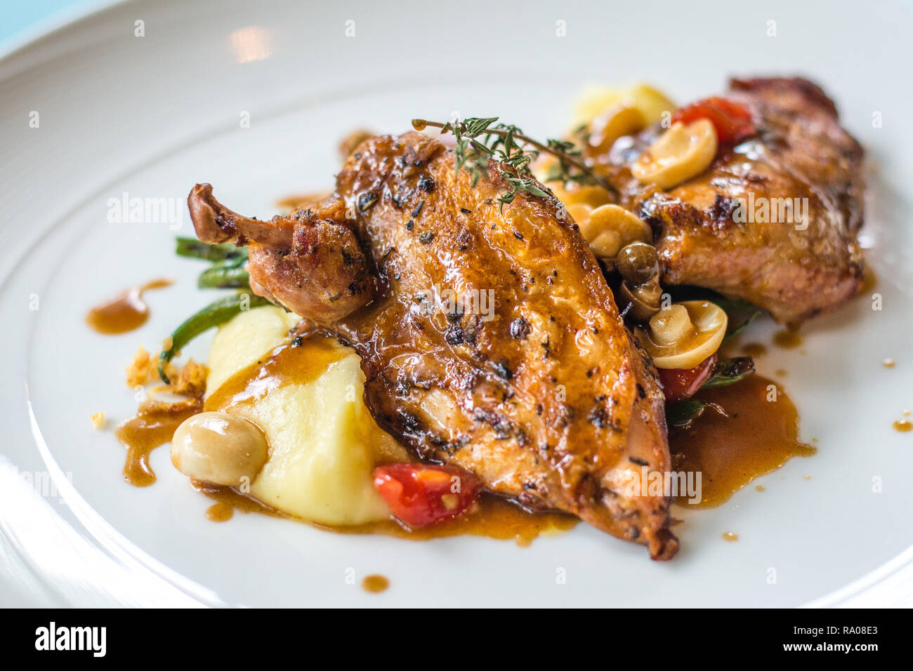 Grilled Poulet creamy mashed purple yam and sautéed vegetables Stock ...