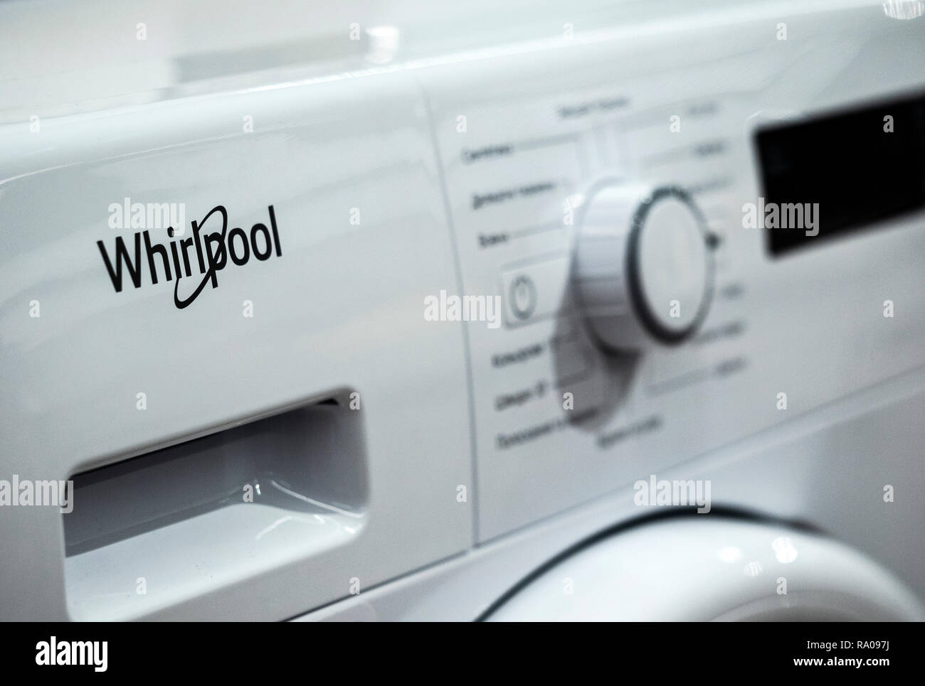 Whirlpool logo on the front of the automatic washing machine Stock ...